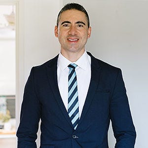 Mario Tucci - Harcourts Rata & Co - realcommercial.com.au